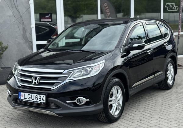Black Honda CR-V 2013 in Radviliskis, with an engine capacity of 2.20 L and mileage of 218 thousand km for 9250 €, photo 5 on AUTOMOTO.COM.LV