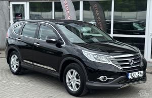 Black Honda CR-V 2013 in Radviliskis, with an engine capacity of 2.20 L and mileage of 218 thousand km for 9250 €, photo 7 on AUTOMOTO.COM.LV
