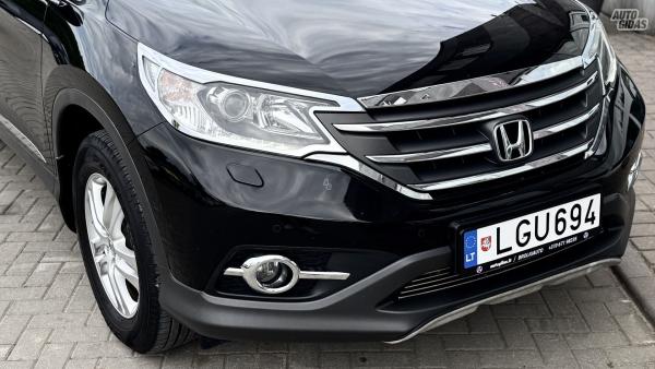 Black Honda CR-V 2013 in Radviliskis, with an engine capacity of 2.20 L and mileage of 218 thousand km for 9250 €, photo 7 on AUTOMOTO.COM.LV