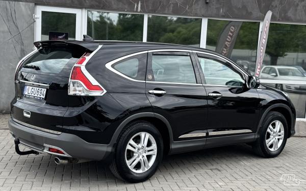 Black Honda CR-V 2013 in Radviliskis, with an engine capacity of 2.20 L and mileage of 218 thousand km for 9250 €, photo 8 on AUTOMOTO.COM.LV
