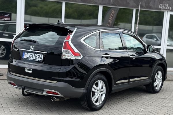 Black Honda CR-V 2013 in Radviliskis, with an engine capacity of 2.20 L and mileage of 218 thousand km for 9250 €, photo 10 on AUTOMOTO.COM.LV