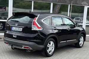 Black Honda CR-V 2013 in Radviliskis, with an engine capacity of 2.20 L and mileage of 218 thousand km for 9250 €, photo 11 on AUTOMOTO.COM.LV