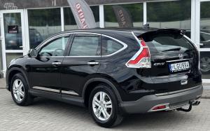 Black Honda CR-V 2013 in Radviliskis, with an engine capacity of 2.20 L and mileage of 218 thousand km for 9250 €, photo 12 on AUTOMOTO.COM.LV