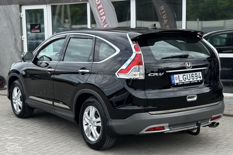 Black Honda CR-V 2013 in Radviliskis, with an engine capacity of 2.20 L and mileage of 218 thousand km for 9250 €, photo 14 on AUTOMOTO.COM.LV