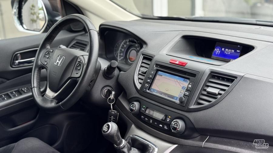 Black Honda CR-V 2013 in Radviliskis, with an engine capacity of 2.20 L and mileage of 218 thousand km for 9250 €, photo 18 on AUTOMOTO.COM.LV