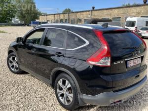 Black Honda CR-V 2013 in Riga, with an engine capacity of 2.00 L and mileage of 250 thousand km for 10500 €, photo 4 on AUTOMOTO.COM.LV