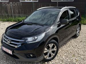 Black Honda CR-V 2013 in Riga, with an engine capacity of 2.00 L and mileage of 250 thousand km for 10500 €, photo 5 on AUTOMOTO.COM.LV