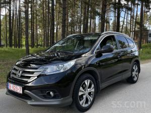 Black Honda CR-V 2013 in Riga, with an engine capacity of 2.00 L and mileage of 250 thousand km for 10500 €, photo 6 on AUTOMOTO.COM.LV