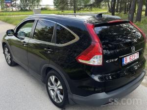 Black Honda CR-V 2013 in Riga, with an engine capacity of 2.00 L and mileage of 250 thousand km for 10500 €, photo 7 on AUTOMOTO.COM.LV
