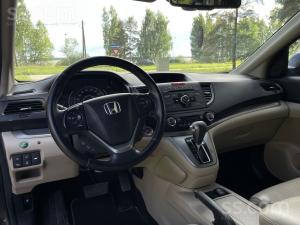 Black Honda CR-V 2013 in Riga, with an engine capacity of 2.00 L and mileage of 250 thousand km for 10500 €, photo 9 on AUTOMOTO.COM.LV