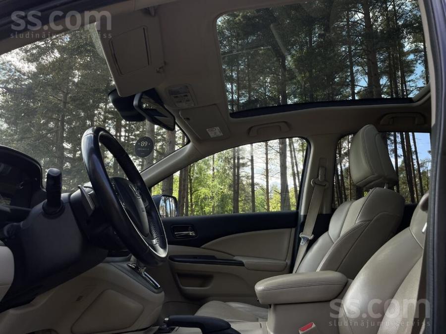 Black Honda CR-V 2013 in Riga, with an engine capacity of 2.00 L and mileage of 250 thousand km for 10500 €, photo 16 on AUTOMOTO.COM.LV