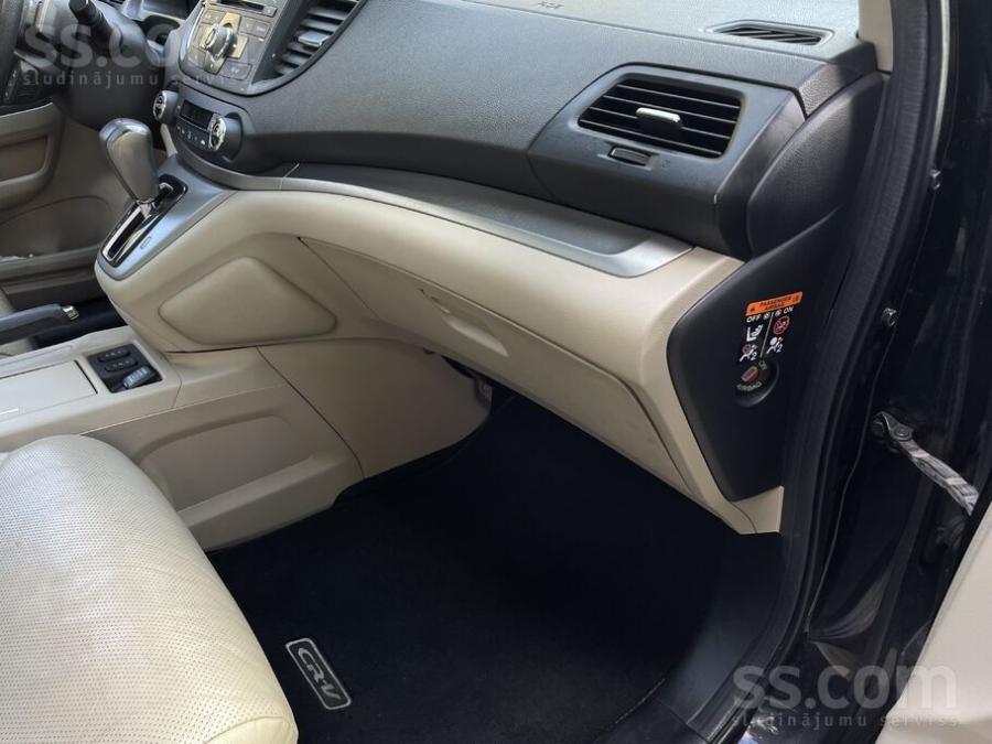 Black Honda CR-V 2013 in Riga, with an engine capacity of 2.00 L and mileage of 250 thousand km for 10500 €, photo 19 on AUTOMOTO.COM.LV