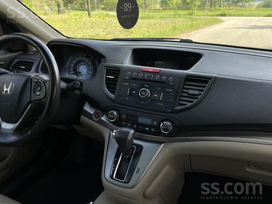 Black Honda CR-V 2013 in Riga, with an engine capacity of 2.00 L and mileage of 250 thousand km for 10500 €, photo 20 on AUTOMOTO.COM.LV