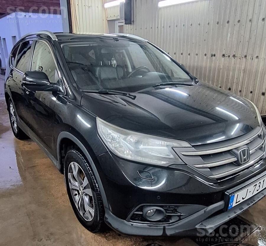 Melns Honda CR-V 2013 Rīga, ar dzinēja tilpumu 2.20 L un nobraukumu 225 tūkst. km par 10500 €, foto 1 vietnē AUTOMOTO.COM.LV