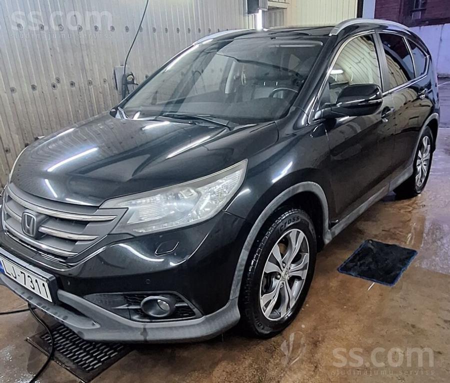 Melns Honda CR-V 2013 Rīga, ar dzinēja tilpumu 2.20 L un nobraukumu 225 tūkst. km par 10500 €, foto 4 vietnē AUTOMOTO.COM.LV