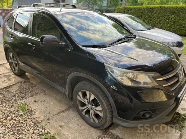 Black Honda CR-V 2013 in Ogre, with an engine capacity of 2.20 L and mileage of 420 thousand km for 7500 €, photo 2 on AUTOMOTO.COM.LV