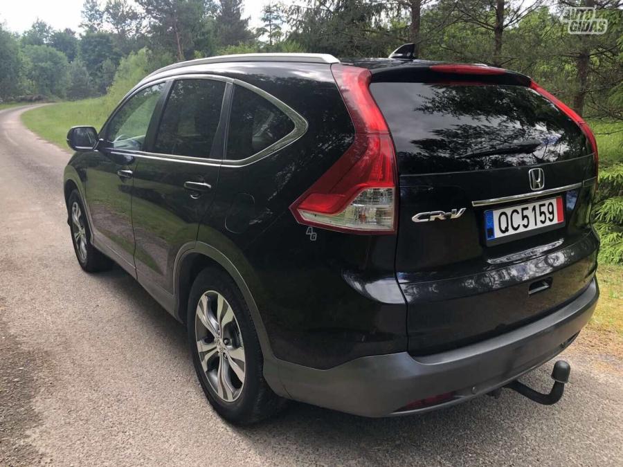 Black Honda CR-V 2013 in Utena, with an engine capacity of 2.20 L and mileage of 255 thousand km for 7900 €, photo 4 on AUTOMOTO.COM.LV