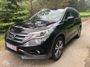 Black Honda CR-V 2013 in Utena, with an engine capacity of 2.20 L and mileage of 255 thousand km for 7900 €, photo 6 on AUTOMOTO.COM.LV