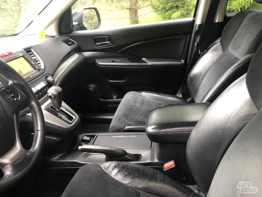 Black Honda CR-V 2013 in Utena, with an engine capacity of 2.20 L and mileage of 255 thousand km for 7900 €, photo 7 on AUTOMOTO.COM.LV