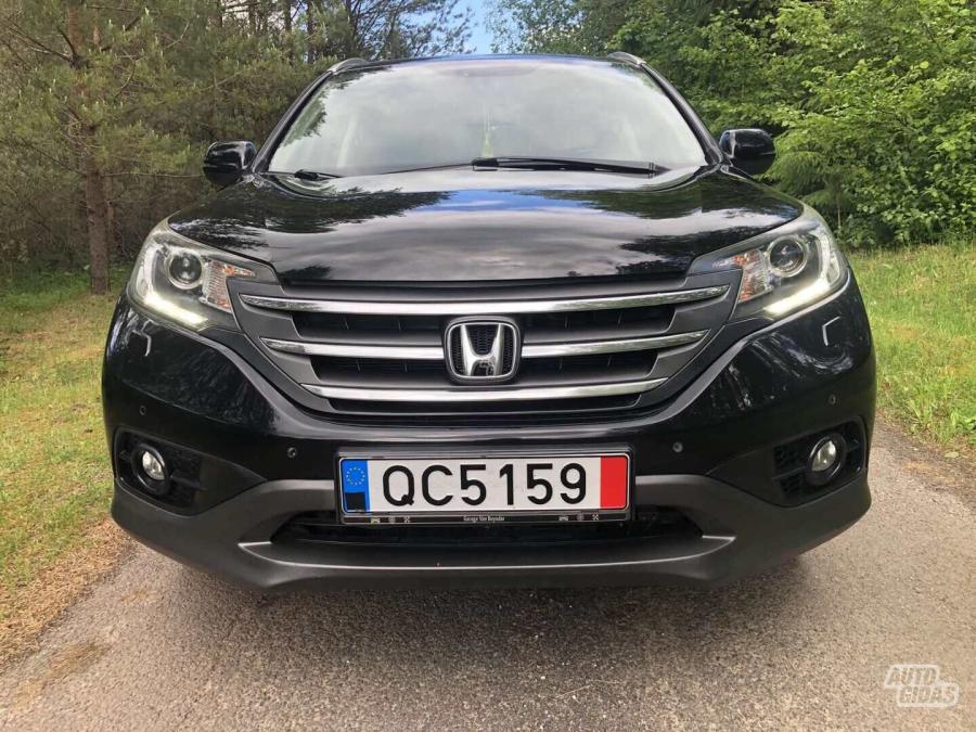 Black Honda CR-V 2013 in Utena, with an engine capacity of 2.20 L and mileage of 255 thousand km for 7900 €, photo 8 on AUTOMOTO.COM.LV