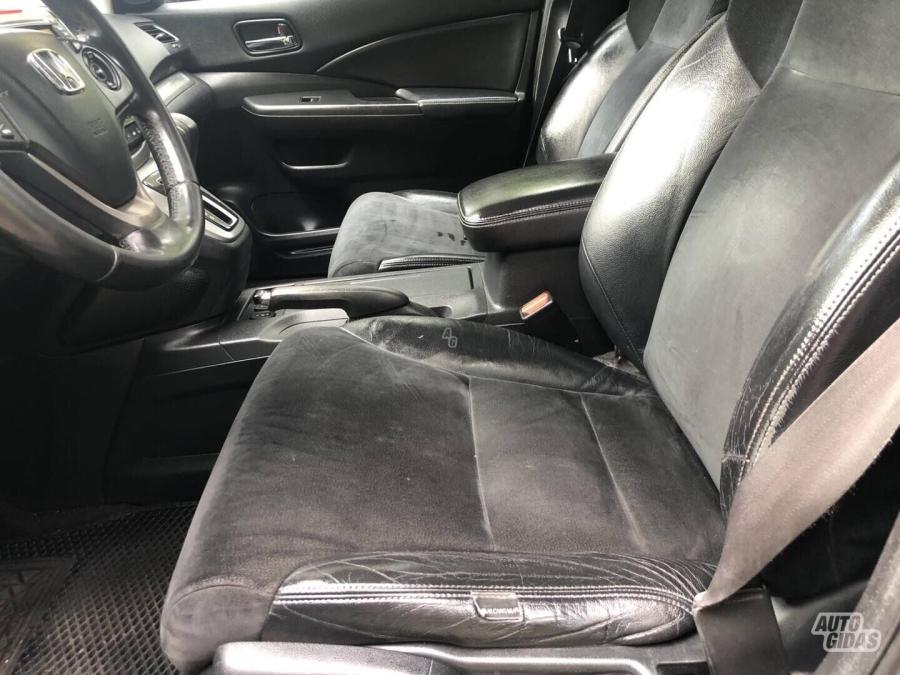 Black Honda CR-V 2013 in Utena, with an engine capacity of 2.20 L and mileage of 255 thousand km for 7900 €, photo 12 on AUTOMOTO.COM.LV