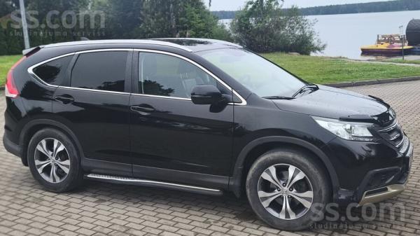 Melns Honda CR-V 2013 Ogre, ar dzinēja tilpumu 2.20 L un nobraukumu 362 tūkst. km par 8500 €, foto 6 vietnē AUTOMOTO.COM.LV