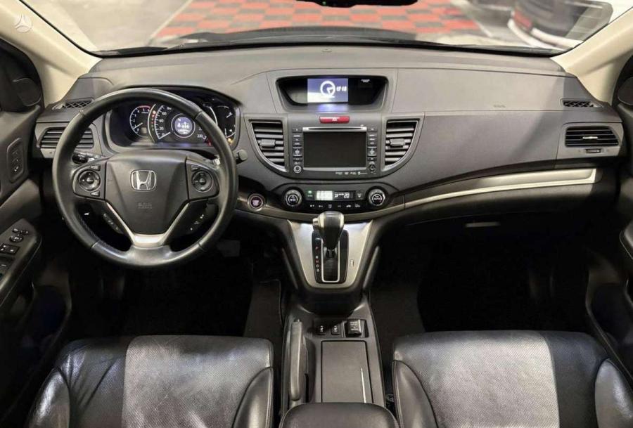 Black Honda CR-V 2013 in Vilnius, with an engine capacity of 2.20 L and mileage of 143 thousand km for 12990 €, photo 19 on AUTOMOTO.COM.LV
