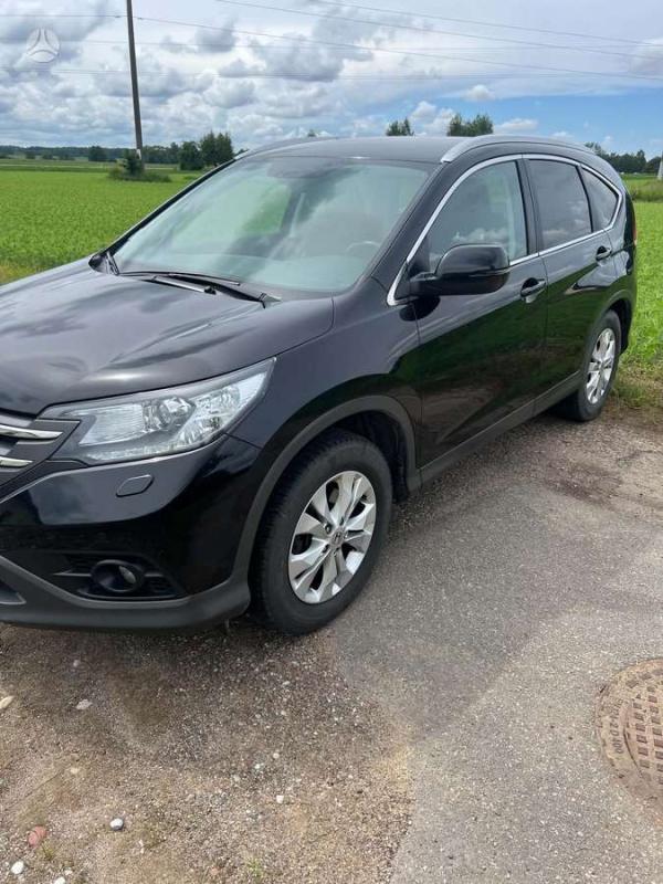 Black Honda CR-V 2013 in Silute, with an engine capacity of 2.20 L and mileage of 240 thousand km for 9500 €, photo 2 on AUTOMOTO.COM.LV
