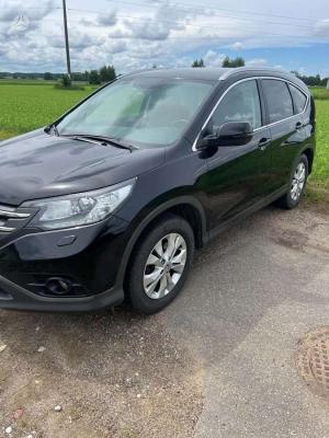 Black Honda CR-V 2013 in Silute, with an engine capacity of 2.20 L and mileage of 240 thousand km for 9500 €, photo 3 on AUTOMOTO.COM.LV