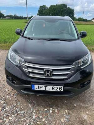 Black Honda CR-V 2013 in Silute, with an engine capacity of 2.20 L and mileage of 240 thousand km for 9500 €, photo 4 on AUTOMOTO.COM.LV