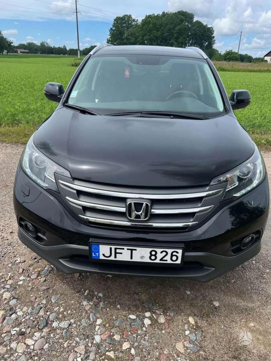 Black Honda CR-V 2013 in Silute, with an engine capacity of 2.20 L and mileage of 240 thousand km for 9500 €, photo 4 on AUTOMOTO.COM.LV