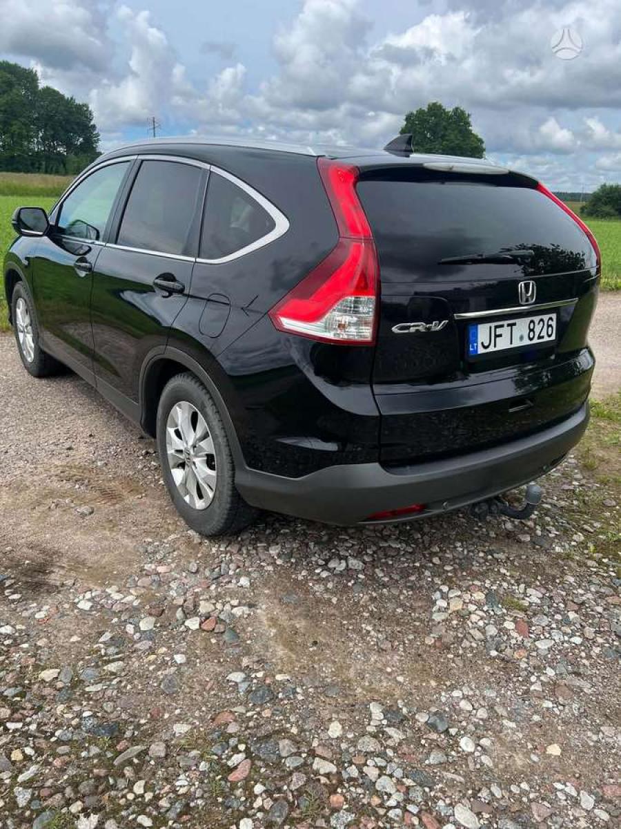Black Honda CR-V 2013 in Silute, with an engine capacity of 2.20 L and mileage of 240 thousand km for 9500 €, photo 5 on AUTOMOTO.COM.LV