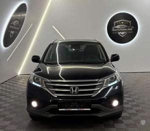Black Honda CR-V 2013 in Marijampole, with an engine capacity of 2.20 L and mileage of 281 thousand km for 10950 €, photo 7 on AUTOMOTO.COM.LV
