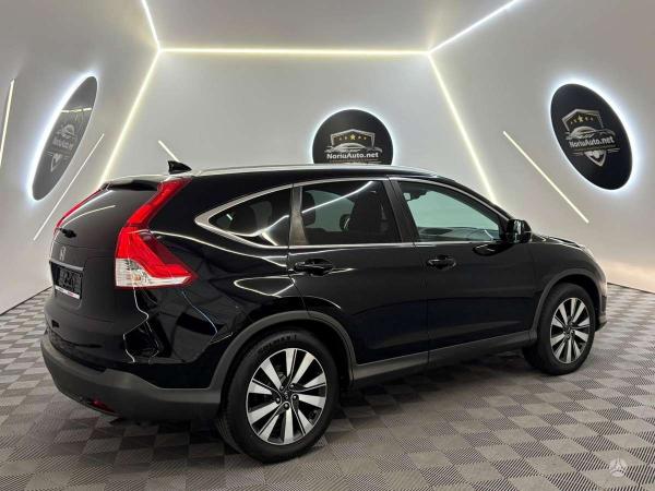 Black Honda CR-V 2013 in Marijampole, with an engine capacity of 2.20 L and mileage of 281 thousand km for 10950 €, photo 7 on AUTOMOTO.COM.LV