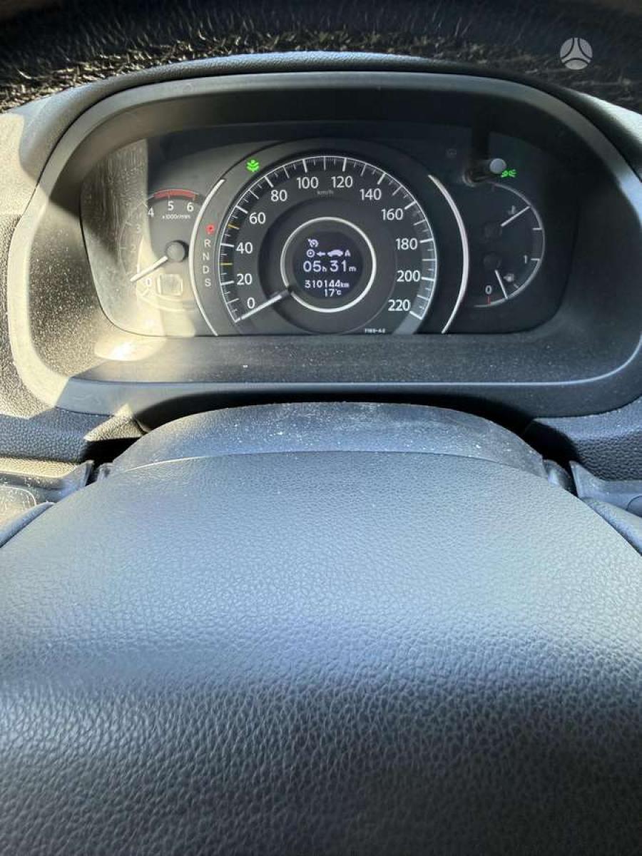 Black Honda CR-V 2013 in Vilnius, with an engine capacity of 2.20 L and mileage of 310 thousand km for 9000 €, photo 7 on AUTOMOTO.COM.LV
