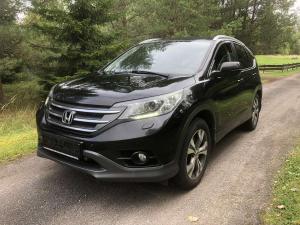 Black Honda CR-V 2013 in Utena, with an engine capacity of 2.20 L and mileage of 278 thousand km for 7300 €, photo 3 on AUTOMOTO.COM.LV