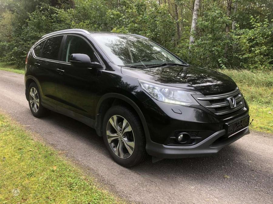 Black Honda CR-V 2013 in Utena, with an engine capacity of 2.20 L and mileage of 278 thousand km for 7300 €, photo 4 on AUTOMOTO.COM.LV