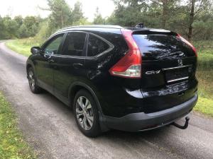 Black Honda CR-V 2013 in Utena, with an engine capacity of 2.20 L and mileage of 278 thousand km for 7300 €, photo 5 on AUTOMOTO.COM.LV