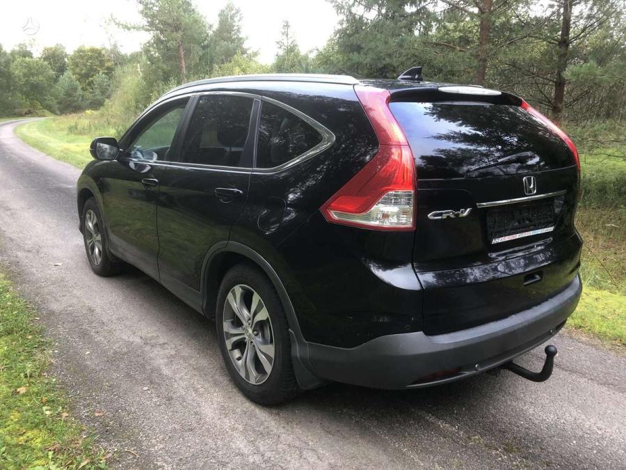Black Honda CR-V 2013 in Utena, with an engine capacity of 2.20 L and mileage of 278 thousand km for 7300 €, photo 5 on AUTOMOTO.COM.LV