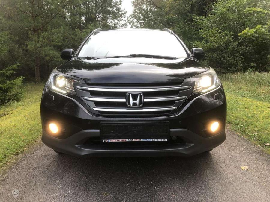 Black Honda CR-V 2013 in Utena, with an engine capacity of 2.20 L and mileage of 278 thousand km for 7300 €, photo 6 on AUTOMOTO.COM.LV