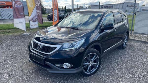 Black Honda CR-V 2013 in Marijampole, with an engine capacity of 2.20 L and mileage of 291 thousand km for 9800 €, photo 8 on AUTOMOTO.COM.LV