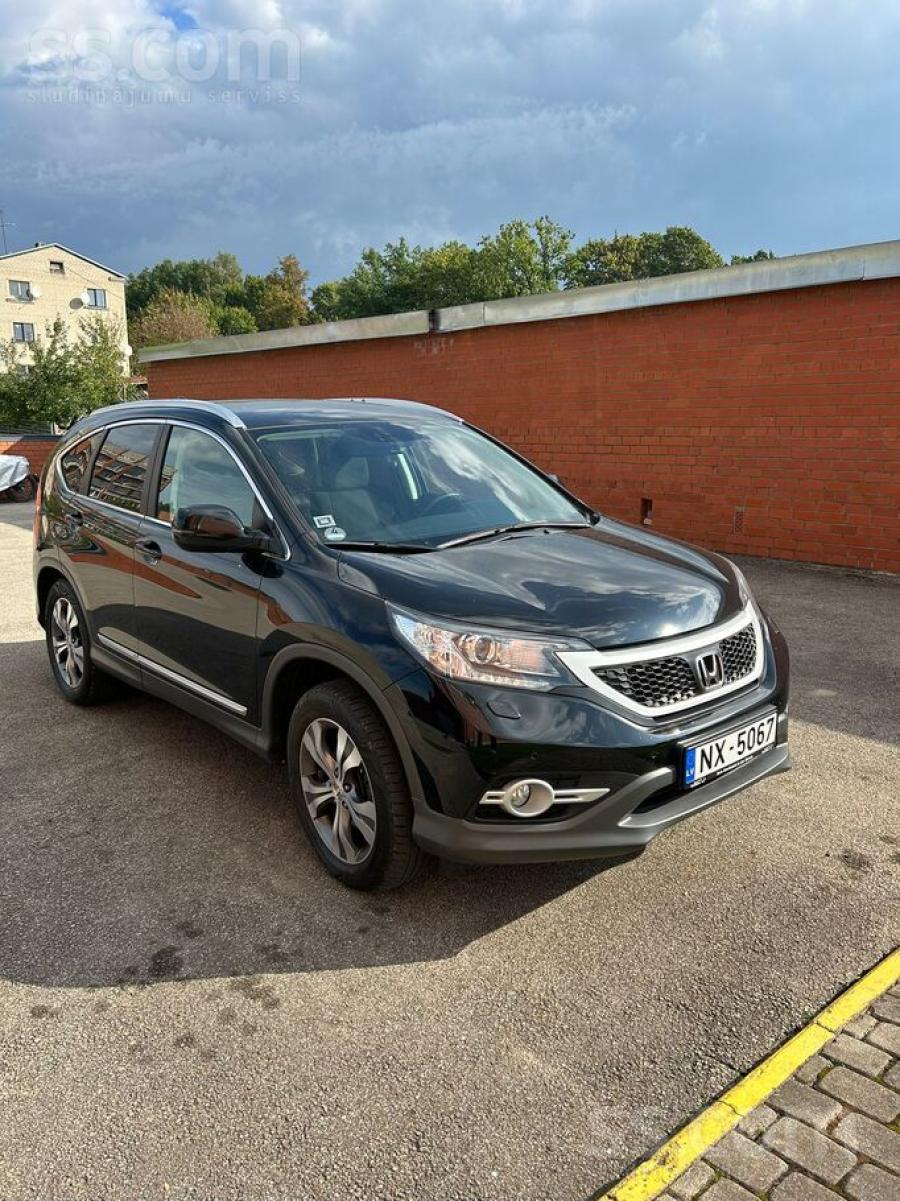 Melns Honda CR-V 2013 Ogre, ar dzinēja tilpumu 2.20 L un nobraukumu 187 tūkst. km par 12400 €, foto 1 vietnē AUTOMOTO.COM.LV
