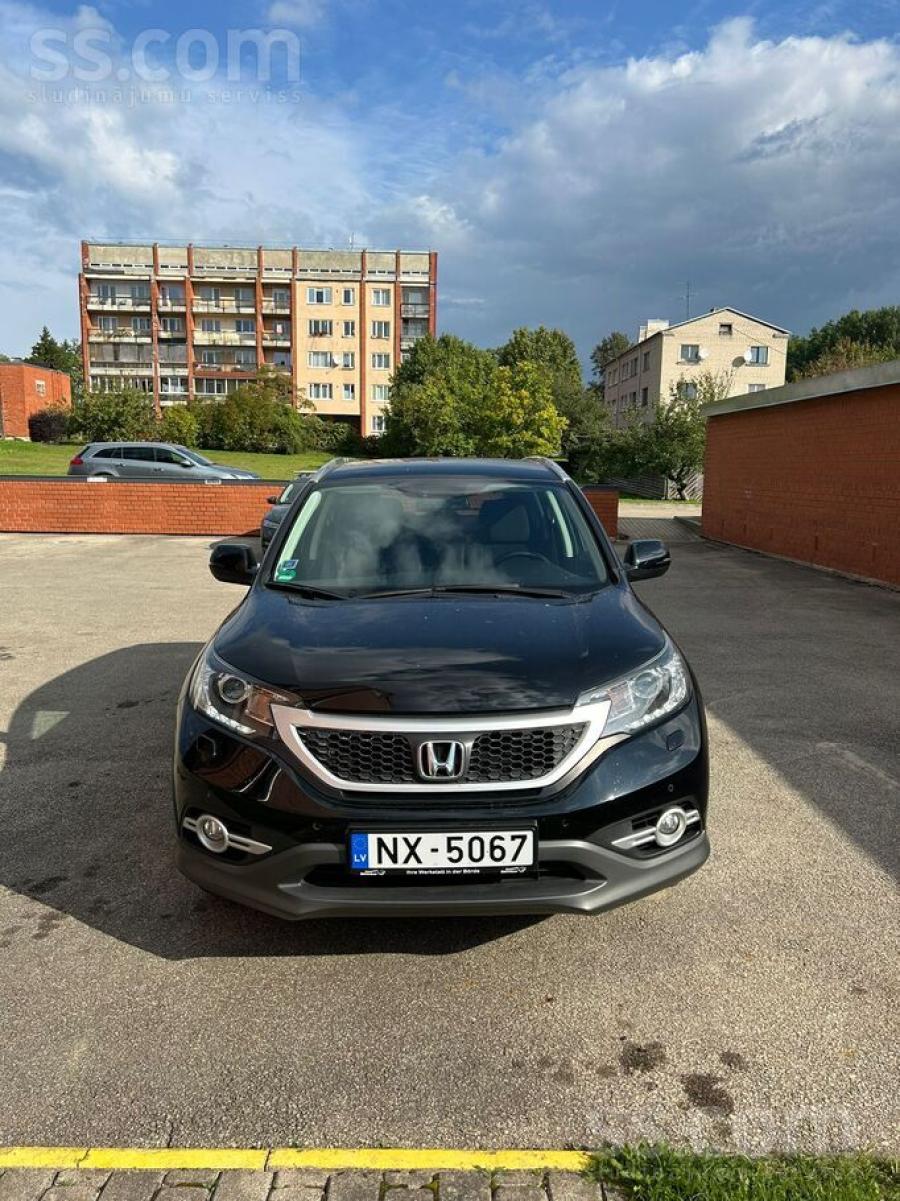 Melns Honda CR-V 2013 Ogre, ar dzinēja tilpumu 2.20 L un nobraukumu 187 tūkst. km par 12400 €, foto 3 vietnē AUTOMOTO.COM.LV