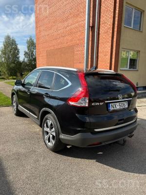 Melns Honda CR-V 2013 Ogre, ar dzinēja tilpumu 2.20 L un nobraukumu 187 tūkst. km par 12400 €, foto 5 vietnē AUTOMOTO.COM.LV
