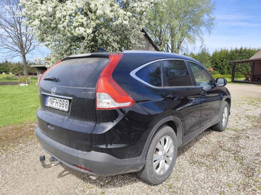 Black Honda CR-V 2014 in Silute, with an engine capacity of 2.20 L and mileage of 277 thousand km for 10000 €, photo 4 on AUTOMOTO.COM.LV