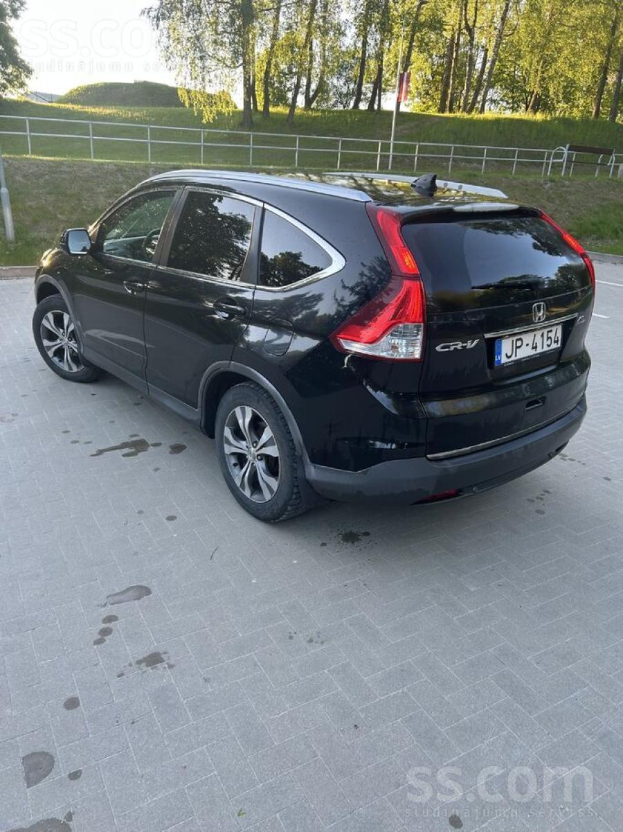 Melns Honda CR-V 2014 Rīga, ar dzinēja tilpumu 1.60 L un nobraukumu 350 tūkst. km par 8900 €, foto 4 vietnē AUTOMOTO.COM.LV