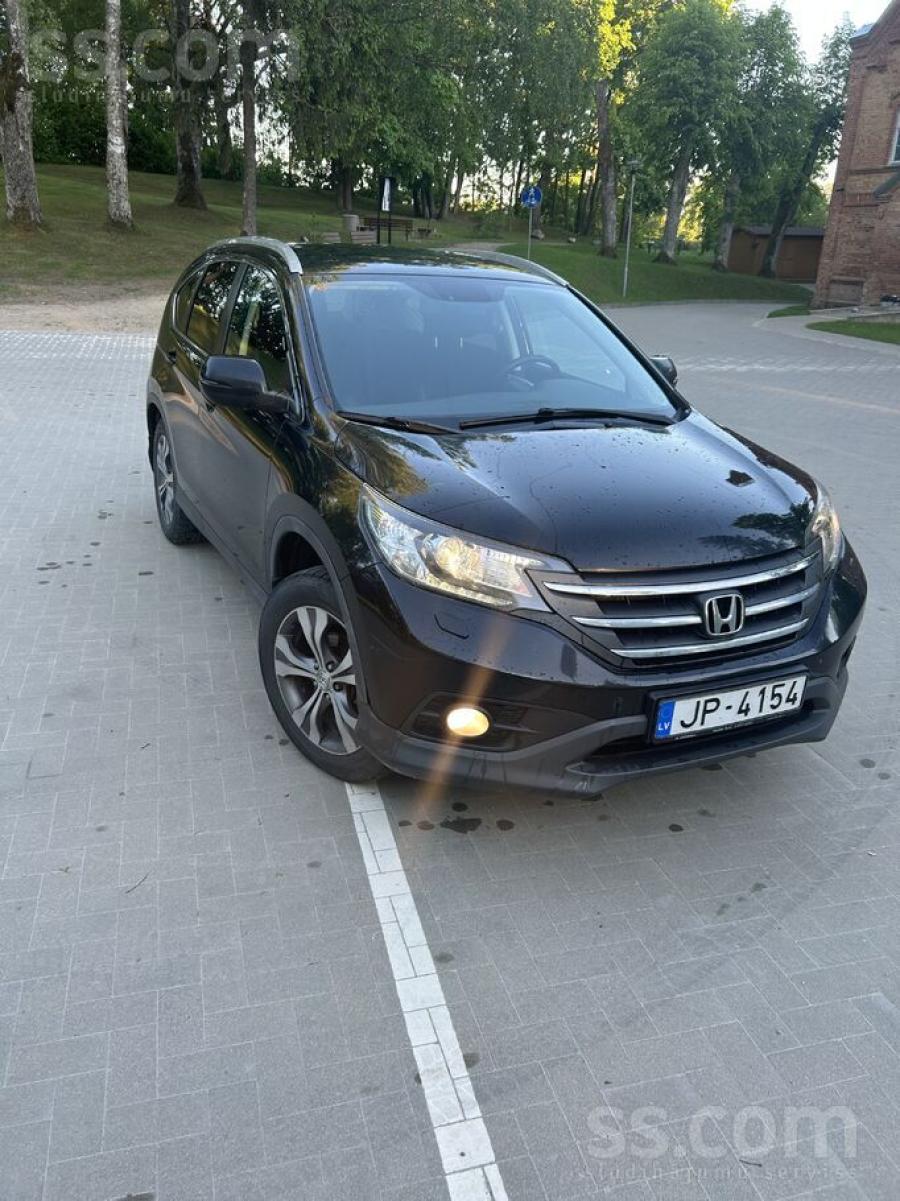 Melns Honda CR-V 2014 Rīga, ar dzinēja tilpumu 1.60 L un nobraukumu 350 tūkst. km par 8900 €, foto 7 vietnē AUTOMOTO.COM.LV