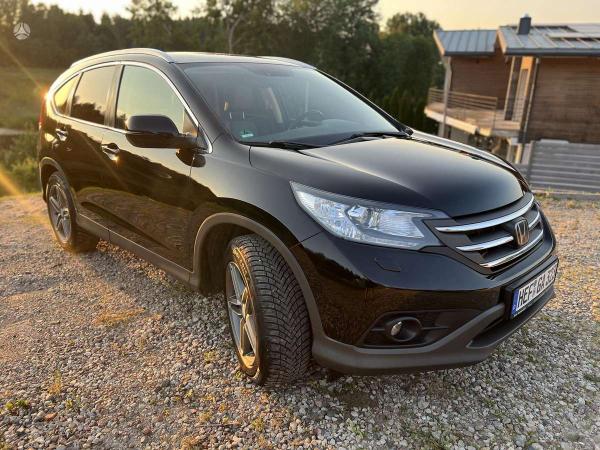 Melns Honda CR-V 2014 Viļņa, ar dzinēja tilpumu 2.20 L un nobraukumu 357 tūkst. km par 10200 €, foto 2 vietnē AUTOMOTO.COM.LV