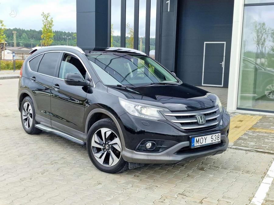 Black Honda CR-V 2014 in Vilnius, with an engine capacity of 2.20 L and mileage of 270 thousand km for 11999 €, photo 3 on AUTOMOTO.COM.LV