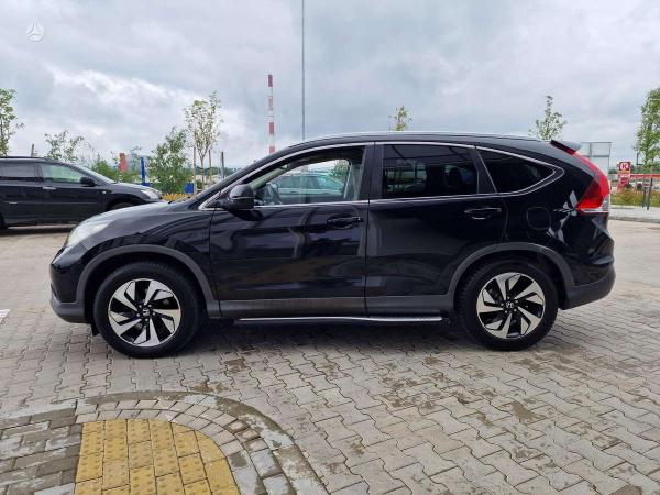 Black Honda CR-V 2014 in Vilnius, with an engine capacity of 2.20 L and mileage of 270 thousand km for 11999 €, photo 6 on AUTOMOTO.COM.LV